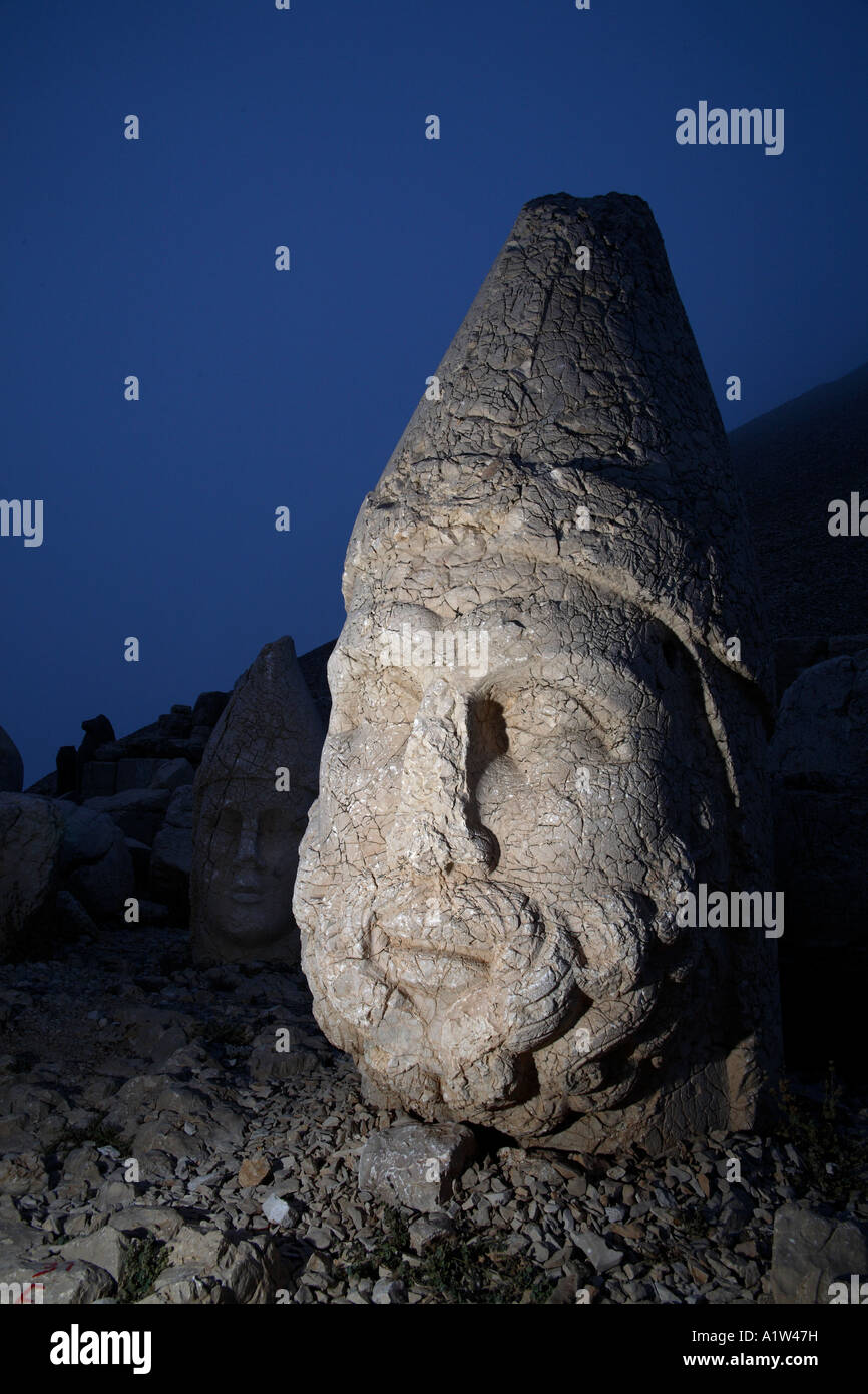 Statue head at Mount Nemrut at twilight, Anatolia, Turkey Stock Photo ...