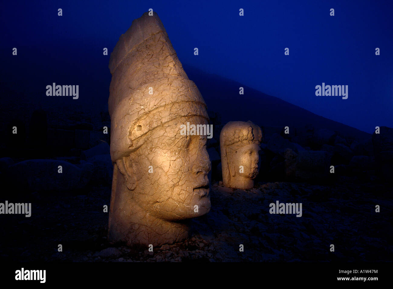 Statue head at Mount Nemrut at twilight, Anatolia, Turkey Stock Photo ...