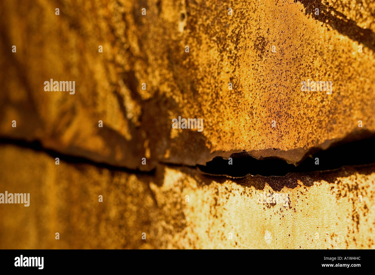 A cut formed by erosion in a metal wall Stock Photo - Alamy