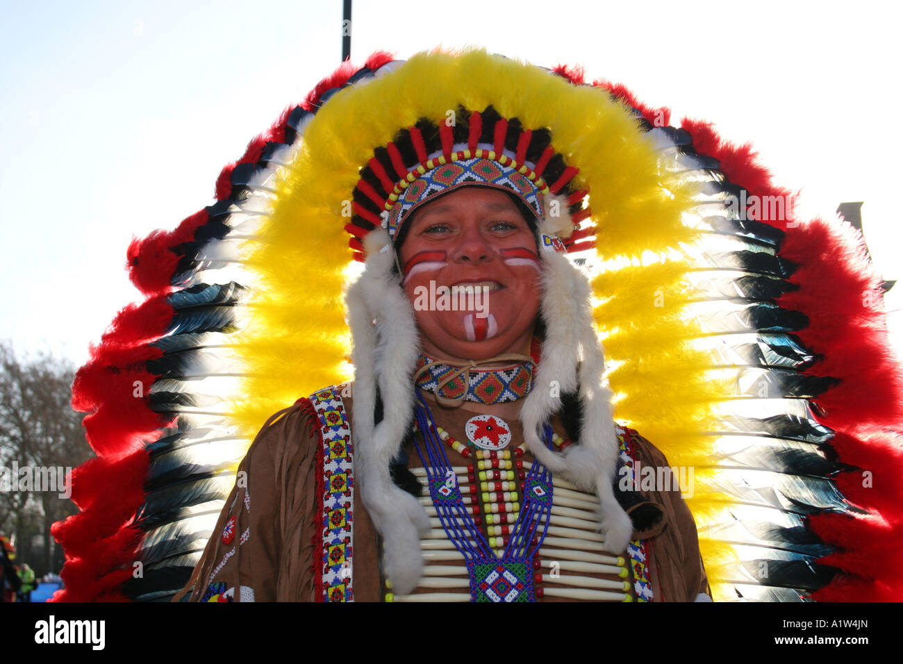 A woman dressed in traditional Red Indian headdress at the New Year’s ...
