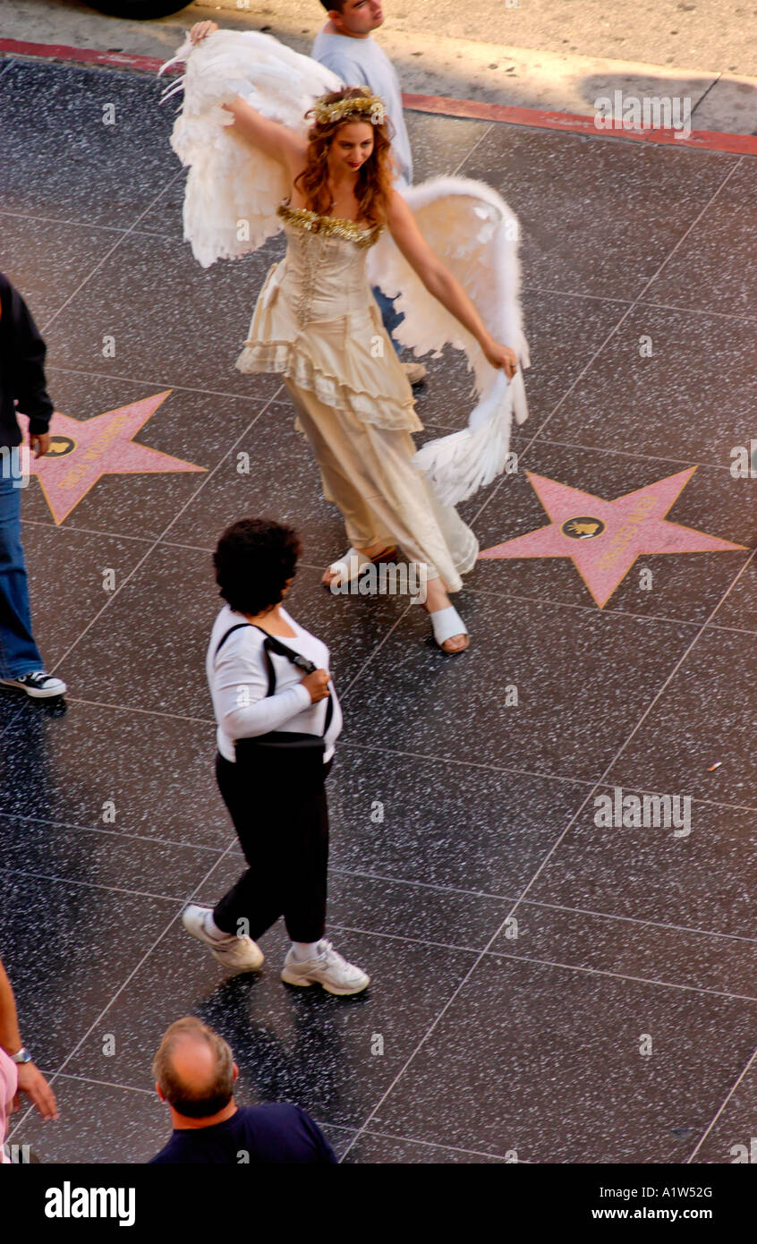 Stock photograph of a street performer dressed as an angel on Hollywood ...