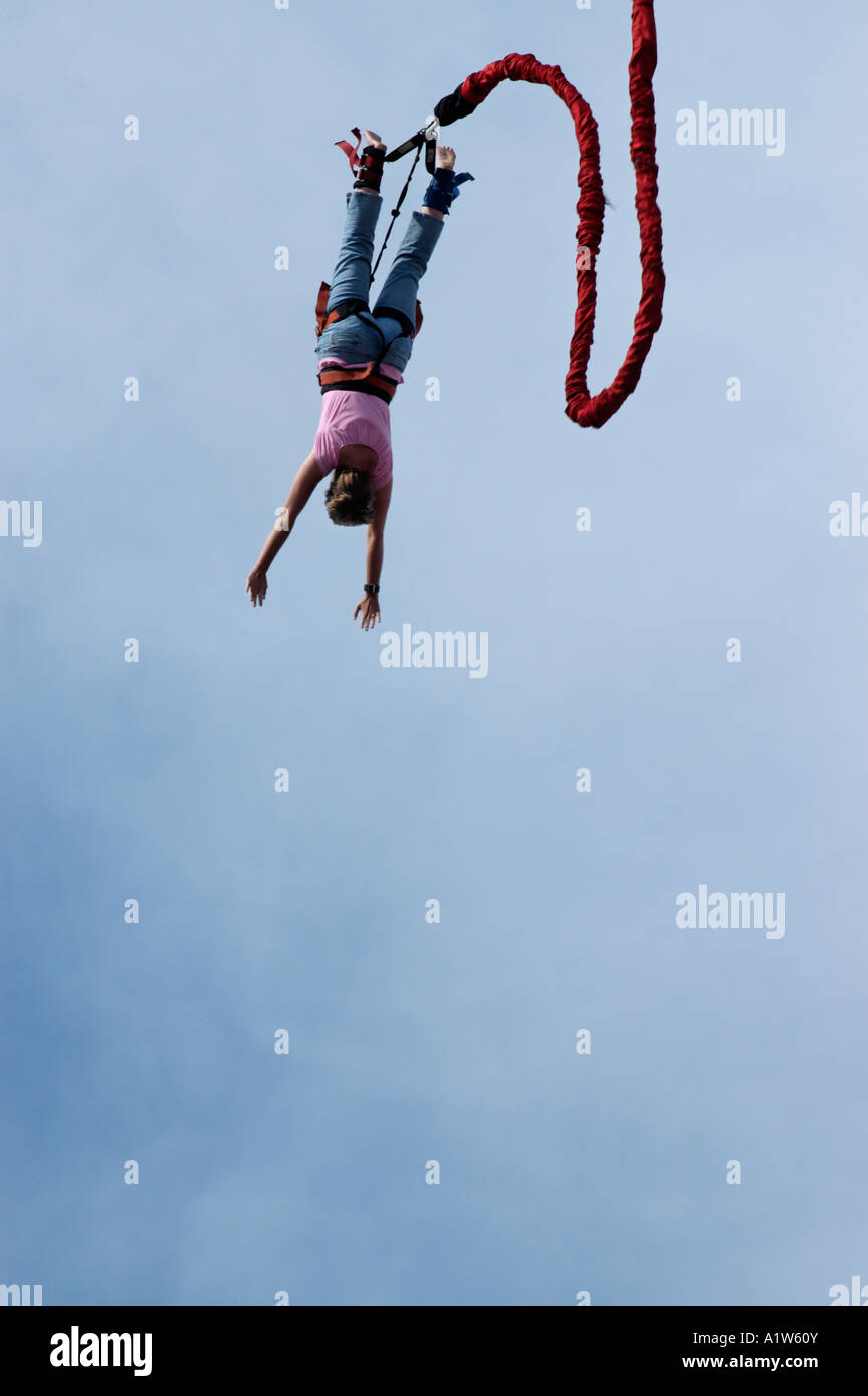 Woman bungee jumping Stock Photo - Alamy