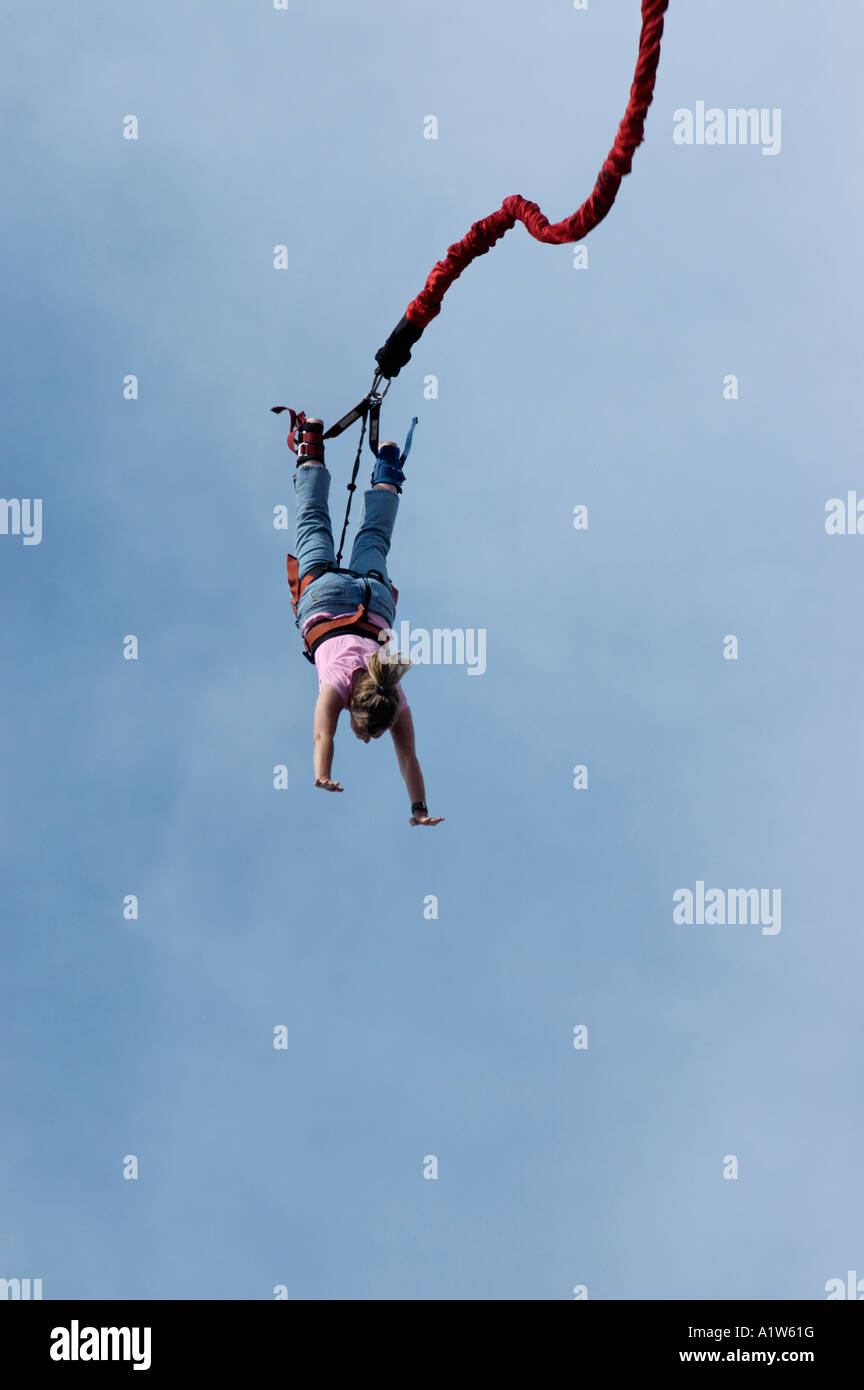 Woman bungee jumping Stock Photo - Alamy