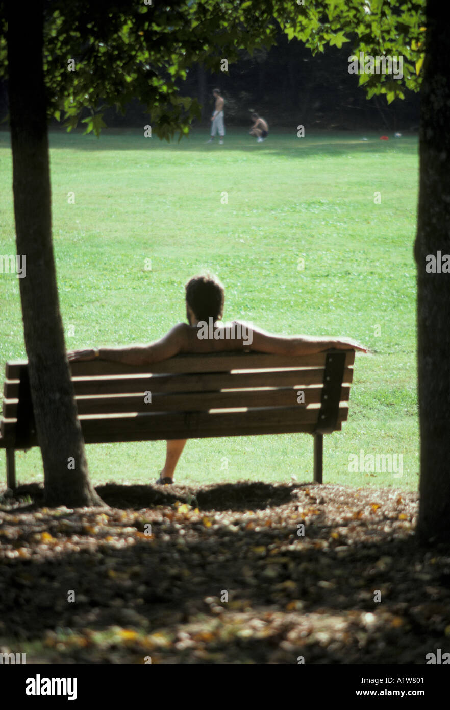 Chilling out on a park bench hi-res stock photography and images - Alamy