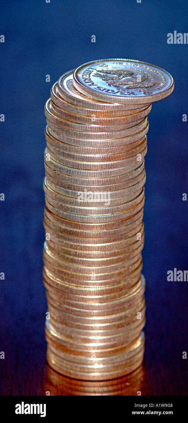 Stack of pure silver coins Stock Photo - Alamy