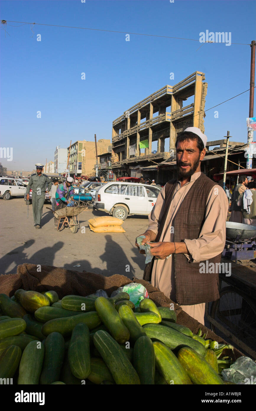 AFGHANISTAN Central Kabul Man selling cucumbers from wheel barrowin ...