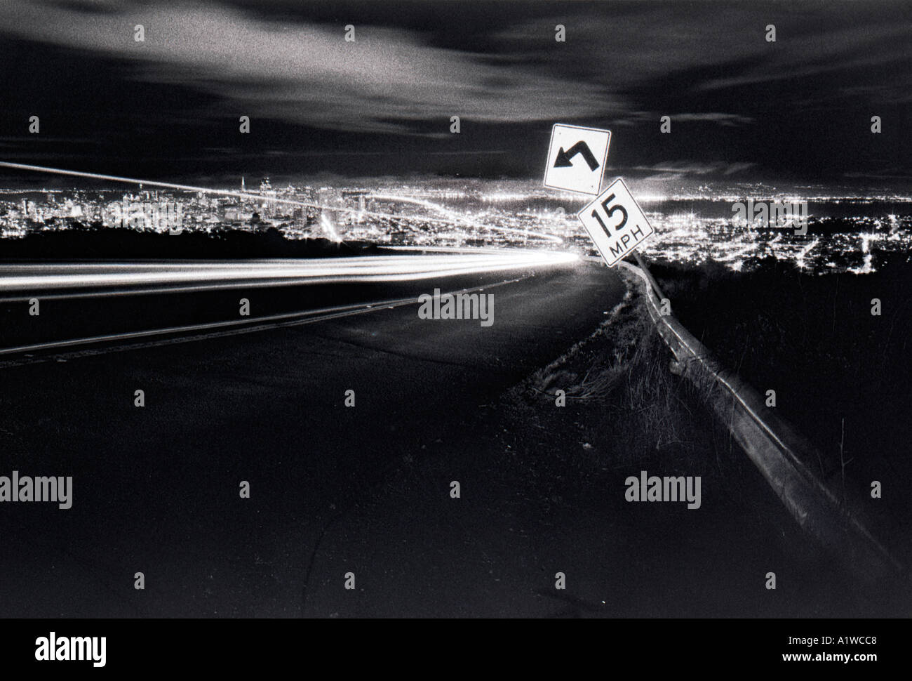 tilted sign at night overlooking downtown San Francisco with streaks of ...