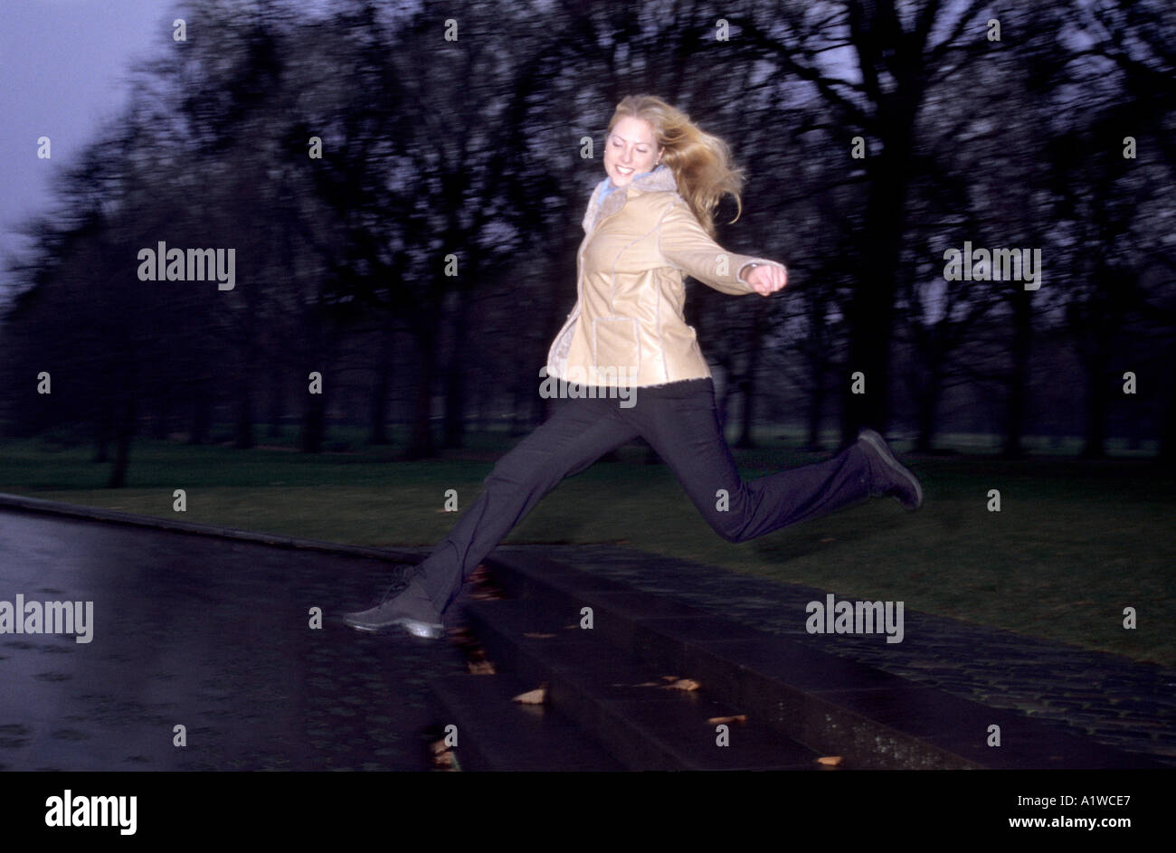 Woman springing winter hi-res stock photography and images - Alamy