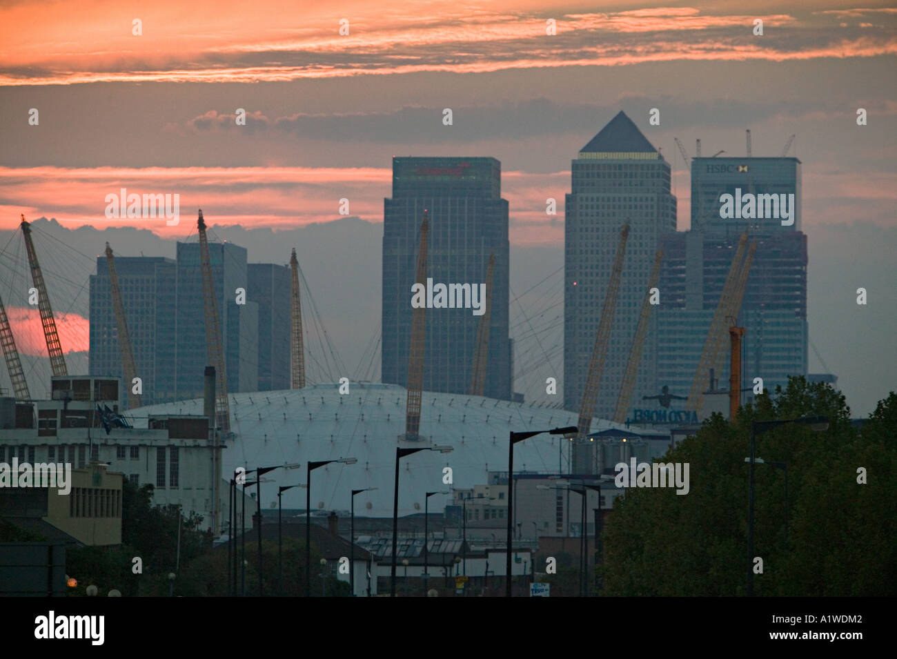 Canary Wharf and the Millennium Dome at sunset, London, UK Stock Photo ...