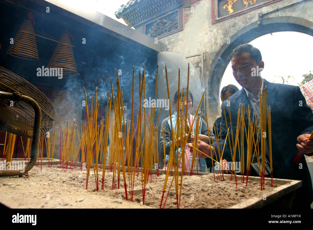 Temple prayers hi-res stock photography and images - Alamy