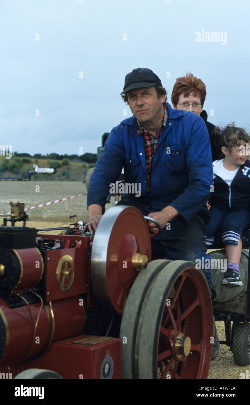 Man on a steam engine Stock Photo - Alamy