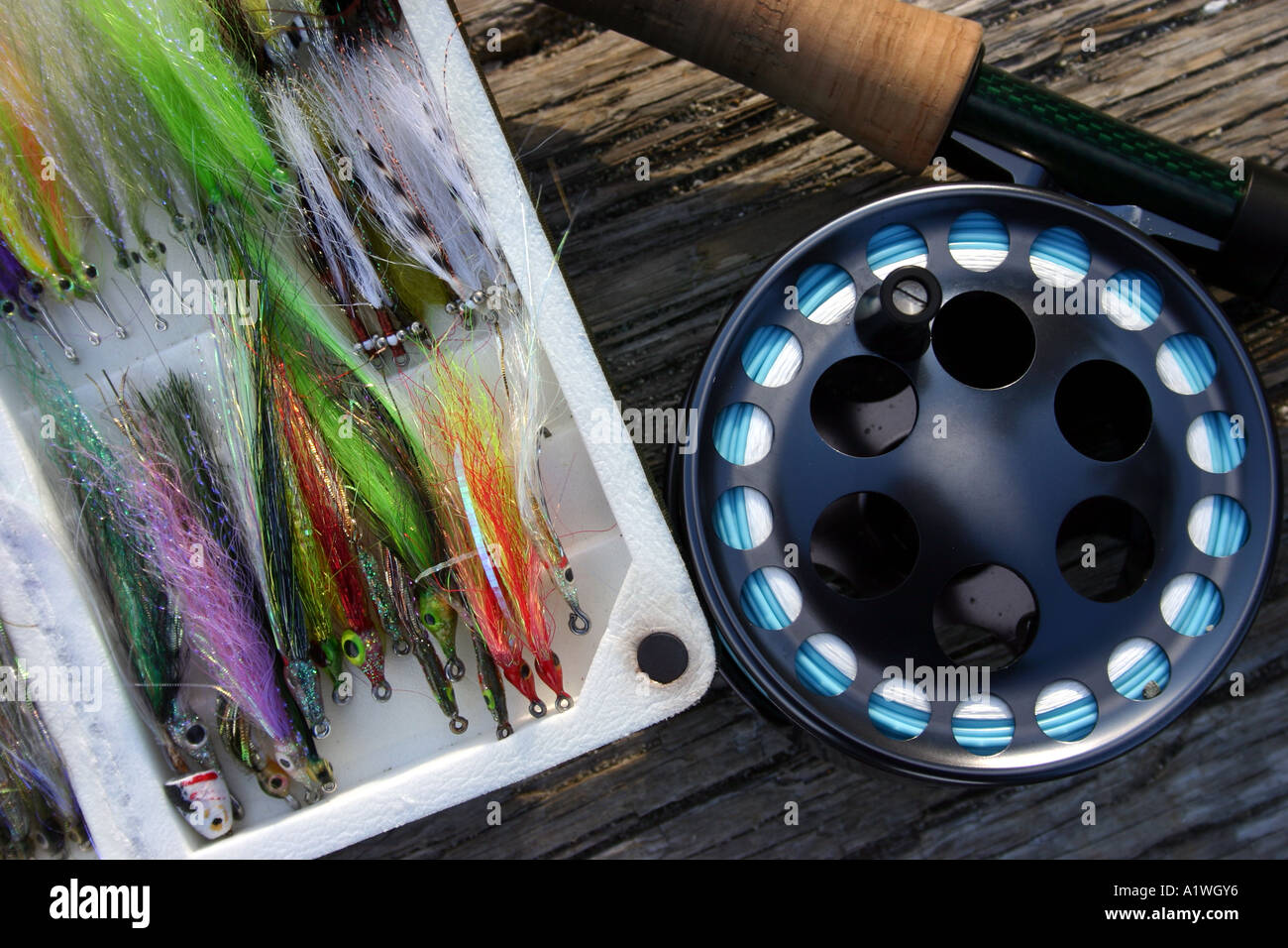 Fly fishing, flies, reel and rod Stock Photo - Alamy