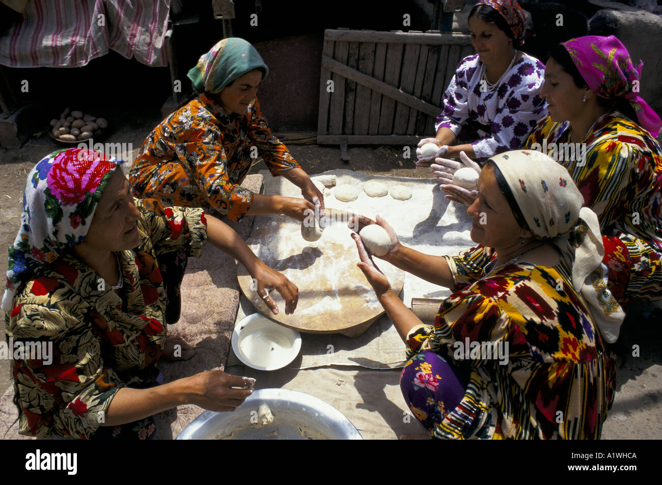 TADZHIKISTAN RURAL SCENE WOMEN MAKING BREAD OUTSIDE 1998 Stock Photo ...
