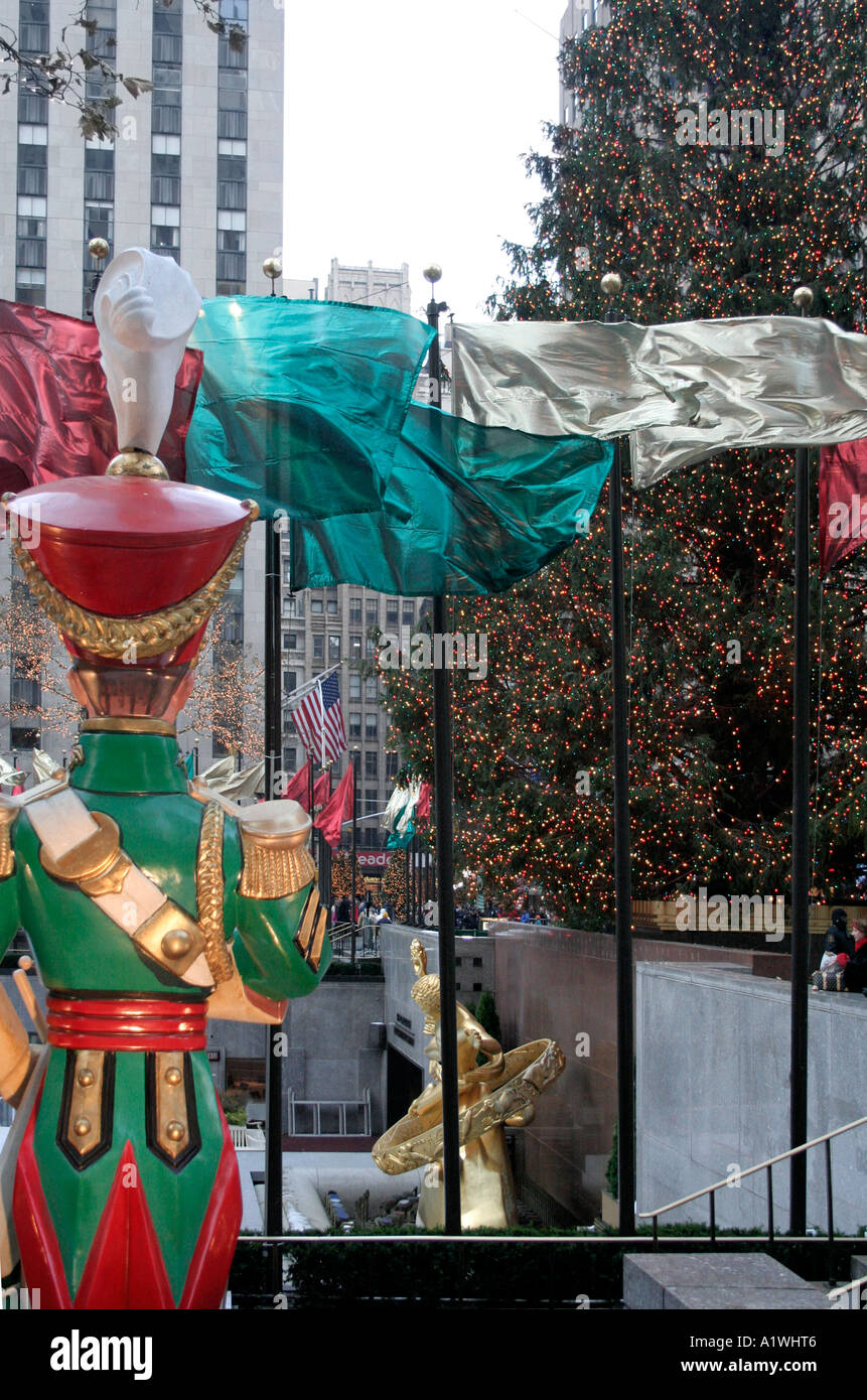 Rockefeller Plaza. Life size soldier statue, flags and Christmas tree ...