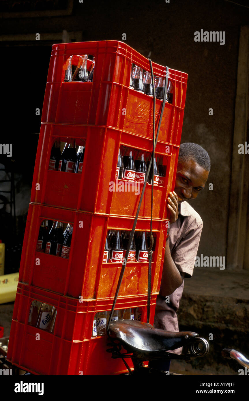 BOY MAKING COCA COLA DELIVERY BY BICYCLE 1996 Stock Photo - Alamy