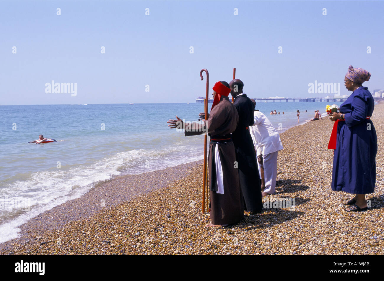 CHRISTIAN BAPTISM BRIGHTON.Ministers give a blessing to the sea before ...