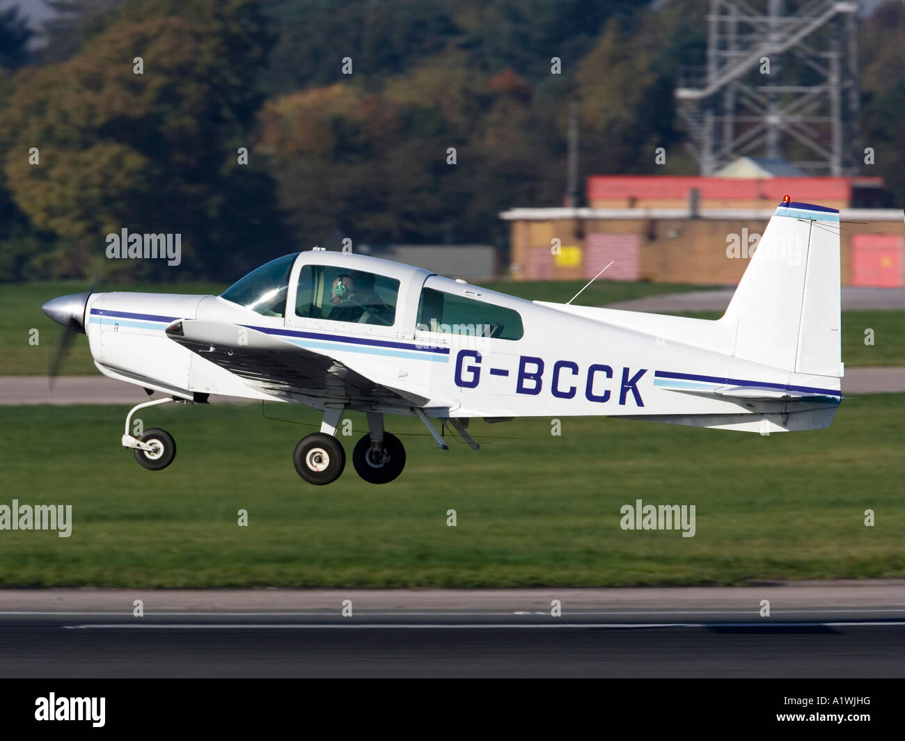 Small single engined proped trainer plane about to touch down Stock ...