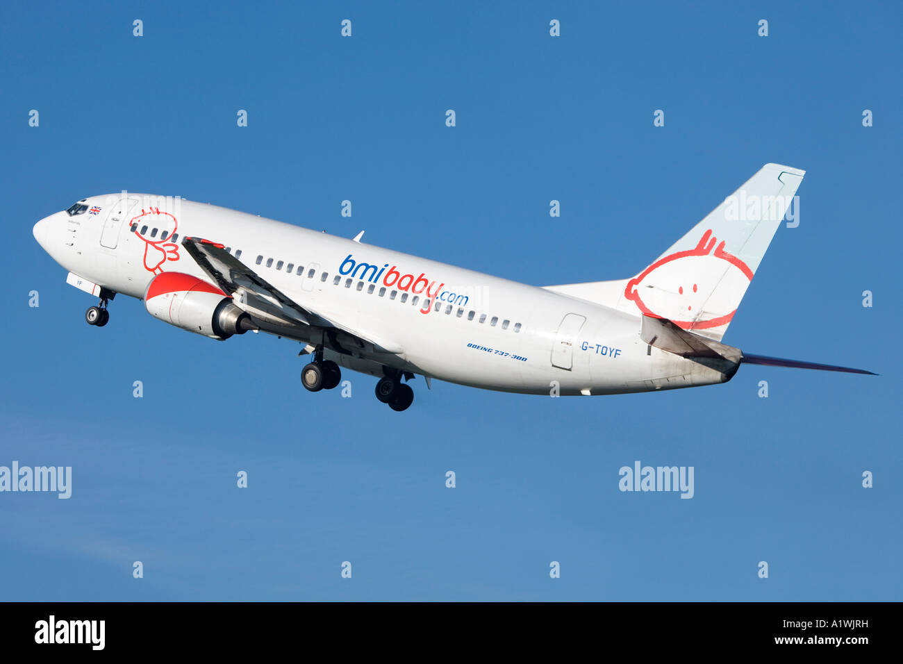 British Midland BMI Boeing 737 departing in blue sky Stock Photo - Alamy