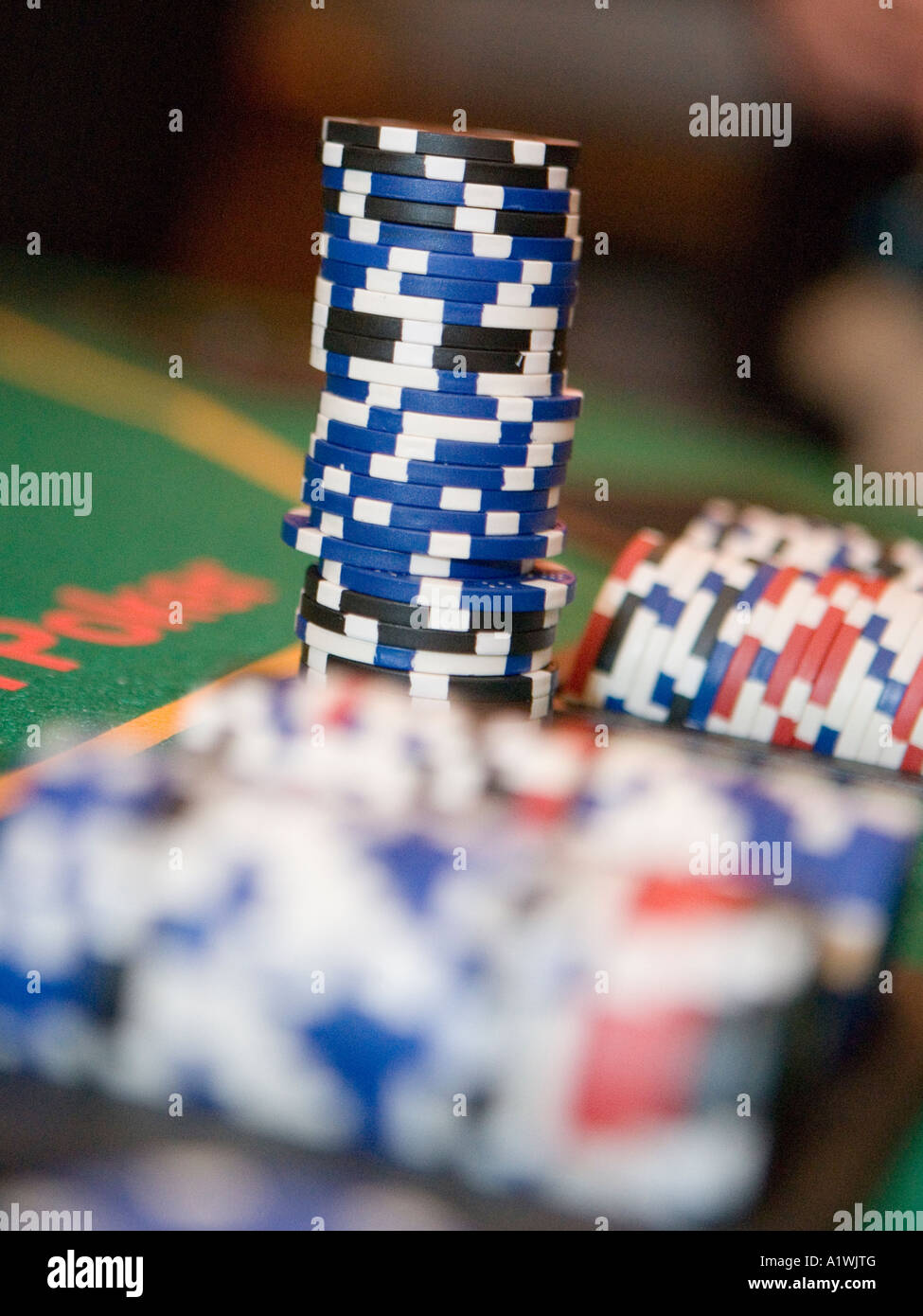 Roulette chips stacked up Stock Photo - Alamy