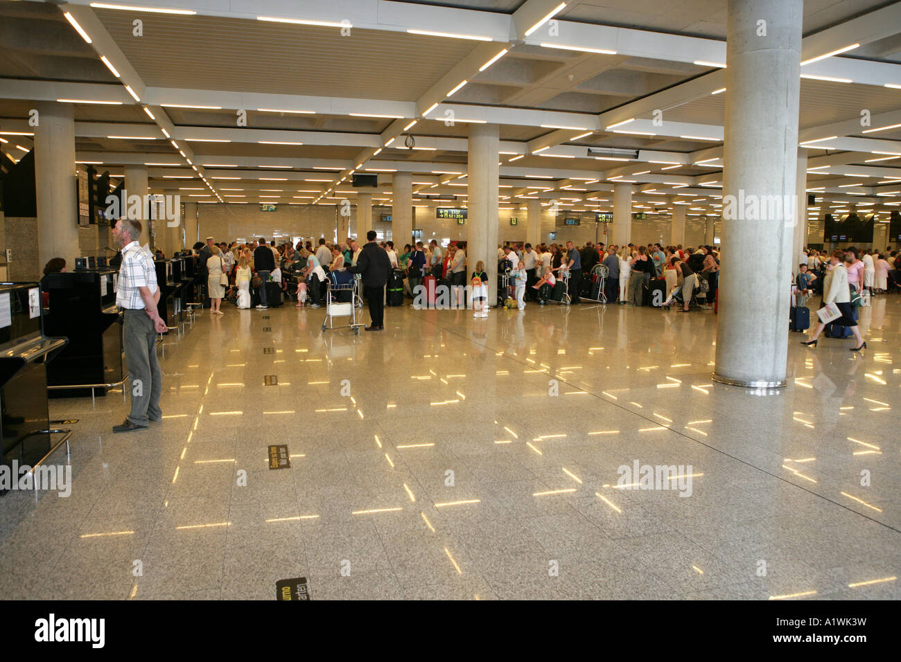 Airport terminal check in area Stock Photo - Alamy