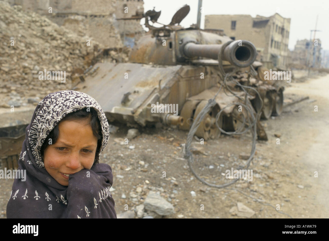 Young girl in front of destroyed tank, TOWN CENTRE, KABUL 1996 Stock ...