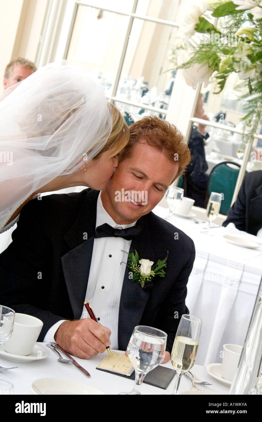 Father groom kissing bride hi-res stock photography and images - Alamy