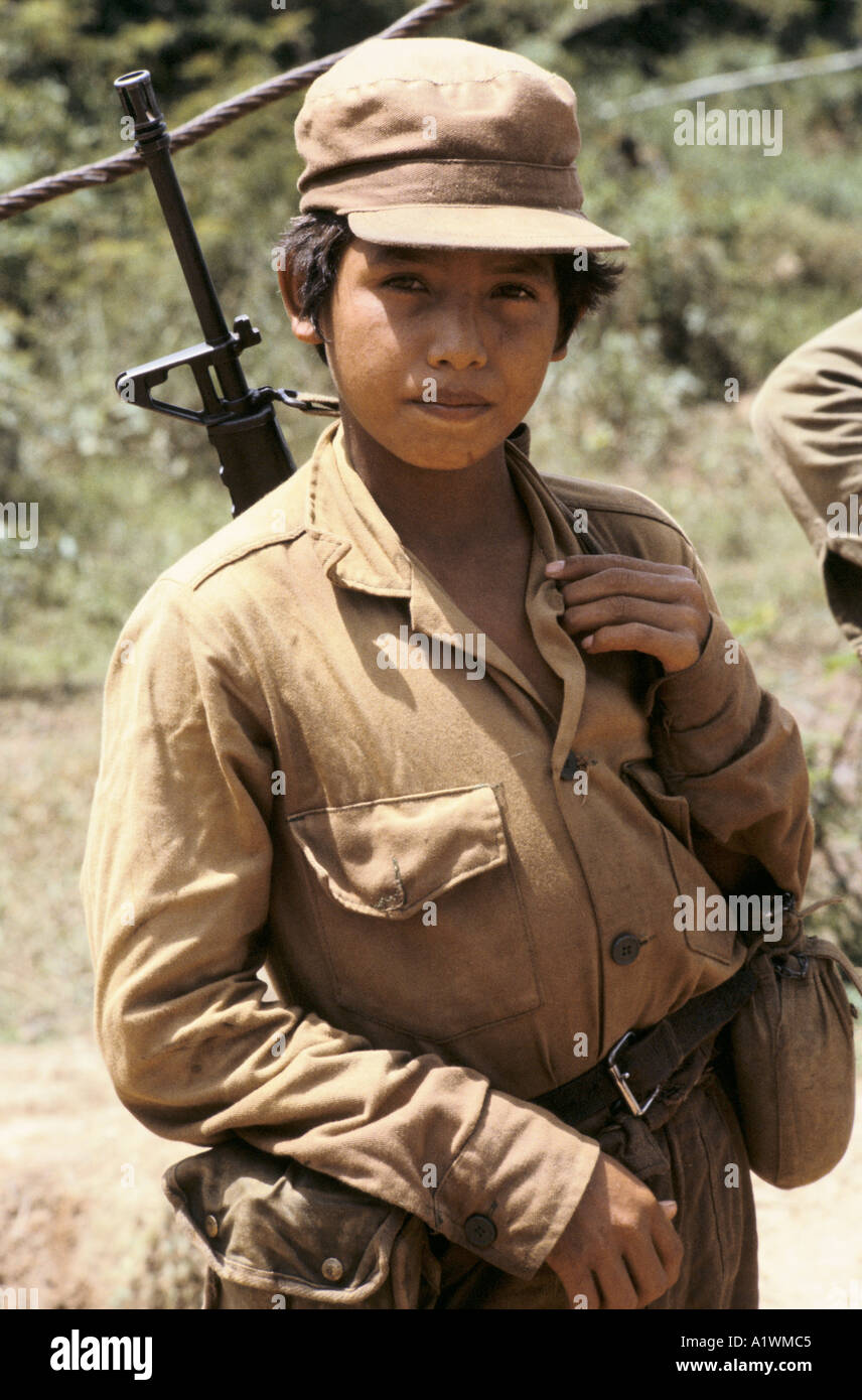 MILITIA .Young girl soldier on patrol during war against the contras ...