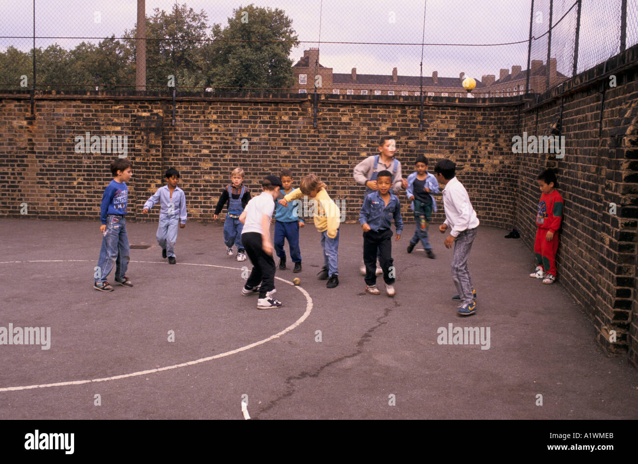 CHILDREN PLAYING IN PLAYGROUND AT SCHOOL Stock Photo - Alamy