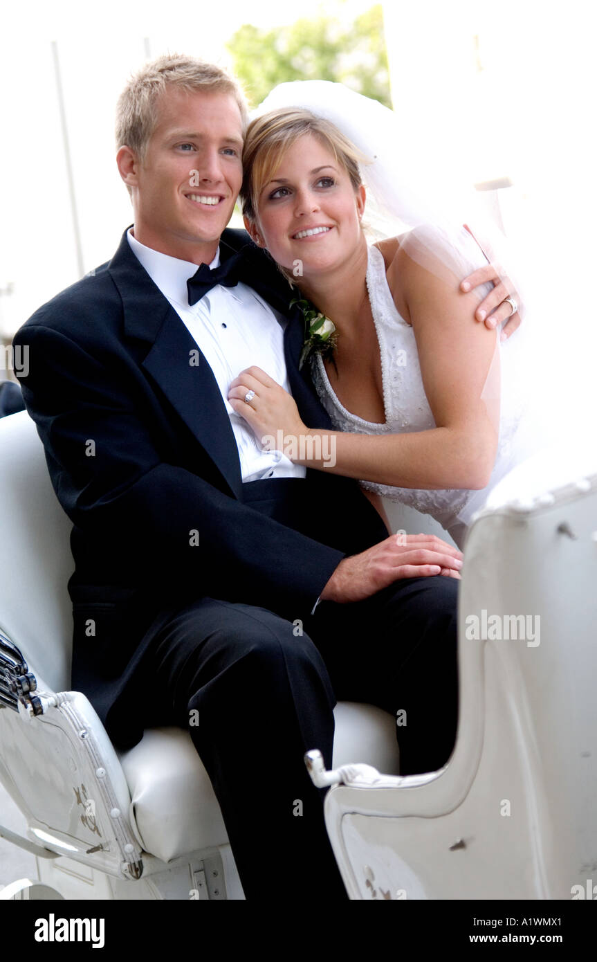 Bride and groom on horse and carriage ride Stock Photo - Alamy