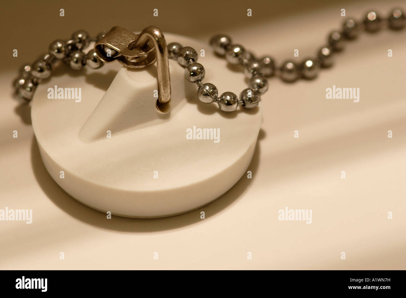 Plug and chain close up Stock Photo - Alamy