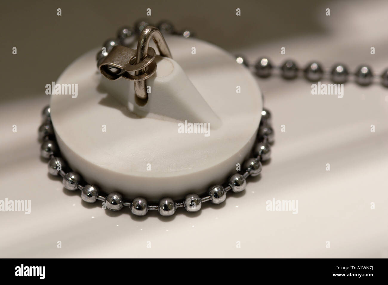Plug and chain close up Stock Photo - Alamy