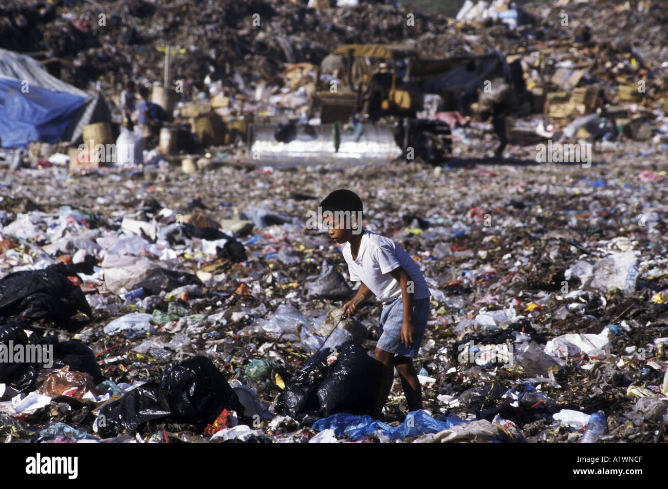 CHILD SCAVENGING ON RUBBISH DUMP PHILIPPINES MANILA 1998 Stock Photo ...