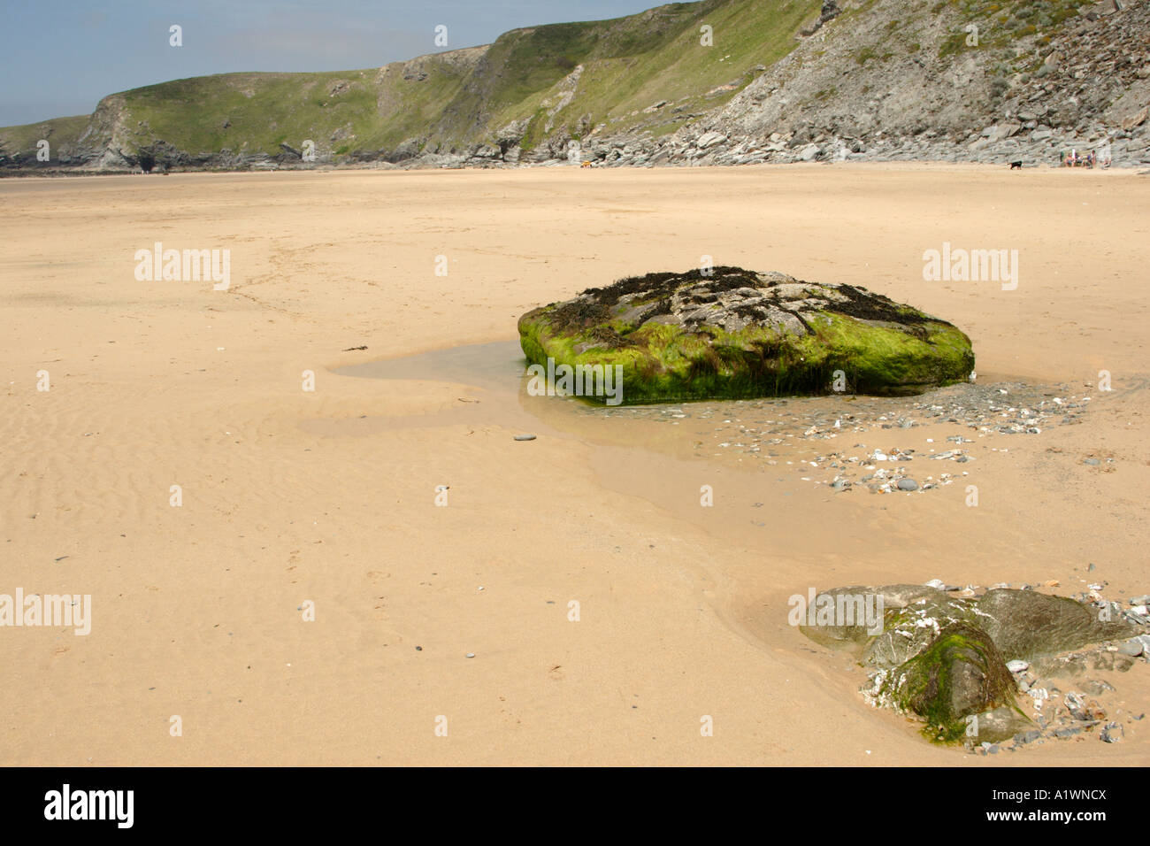 Rocks and pools of water on beach North Cornish coast Cornwall England ...