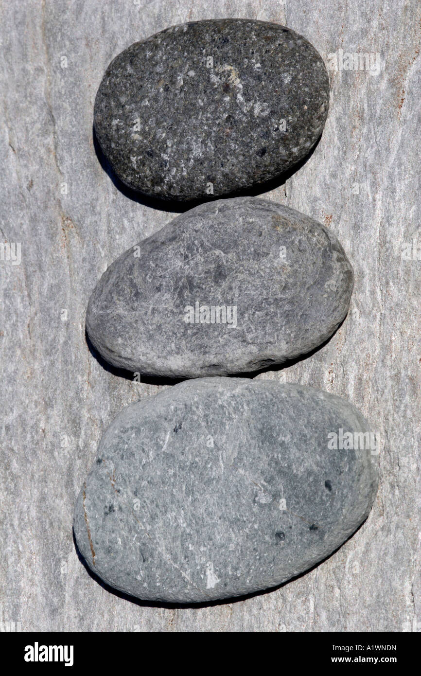 Pebbles in a line close up Stock Photo - Alamy