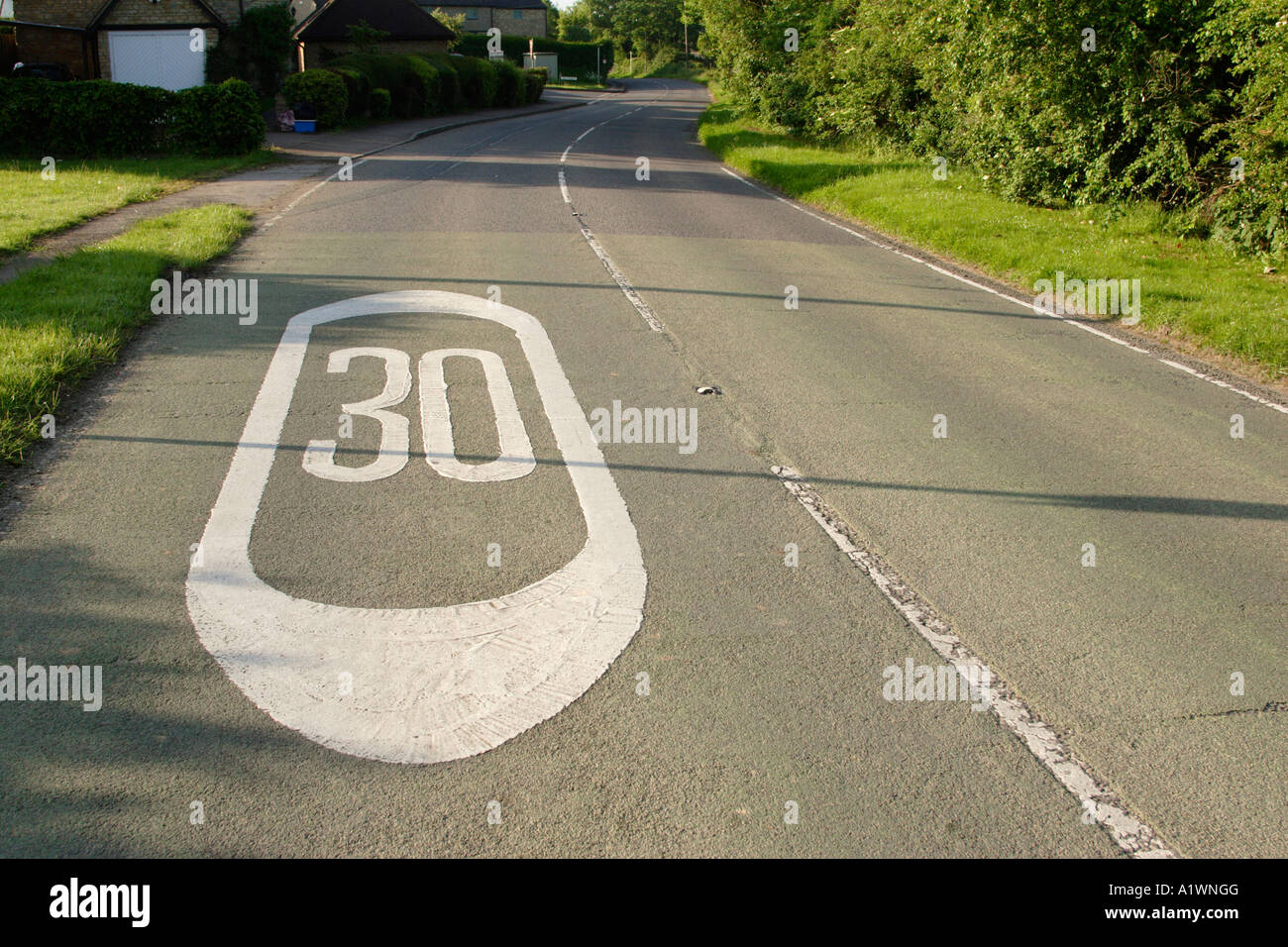 30mph speed sign on road entering Stoke Goldington, Buckinghamshire ...