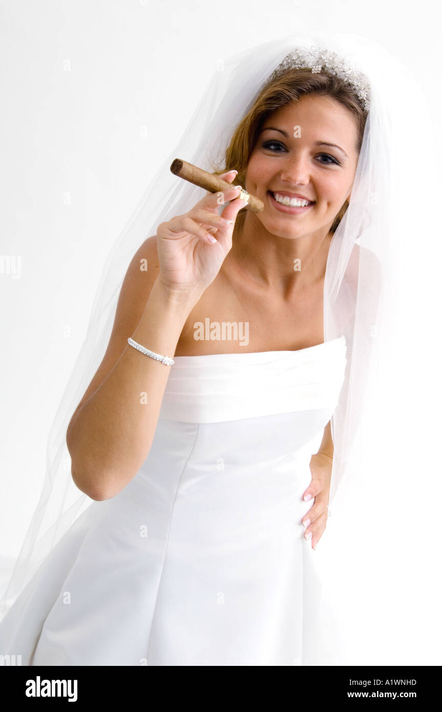 Bride smoking a cigar Stock Photo - Alamy