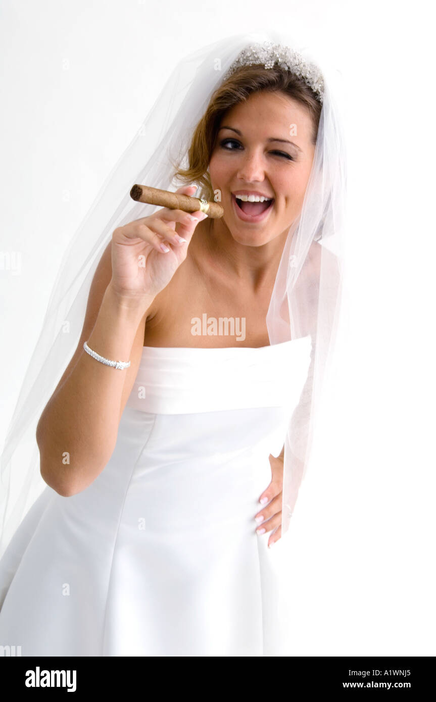Bride smoking a cigar Stock Photo - Alamy