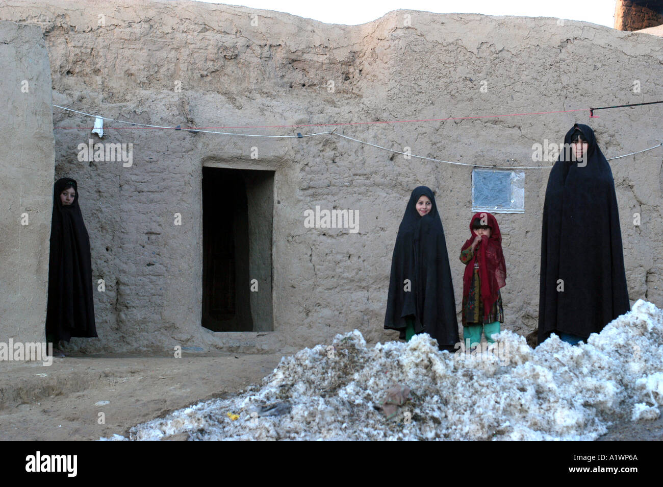 Mother and daughters outside their mud house Kushk e Kona Herat ...