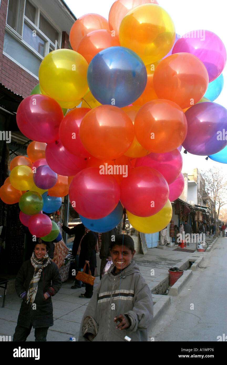 Young boy selling balloons ,Chicken St ,a haunt of visitors because of ...