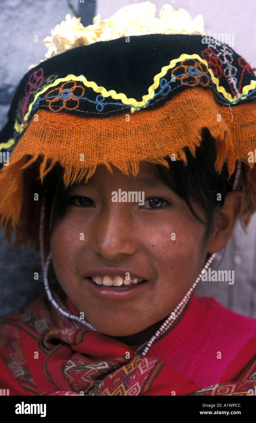 Young Peruvian girl wearing traditional costume Stock Photo - Alamy