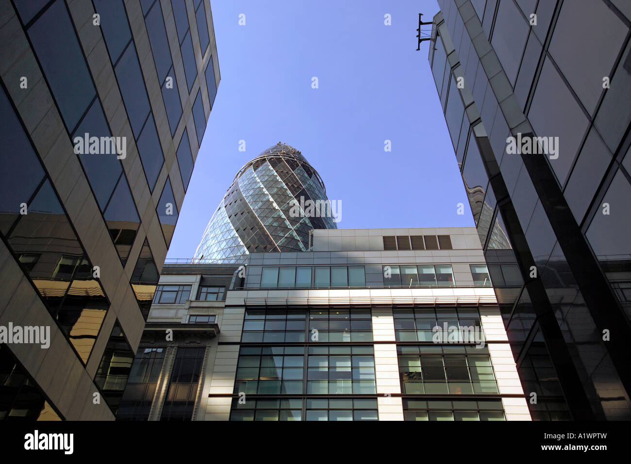 A view of the top of the Swiss Re building aka the Gherkin between ...