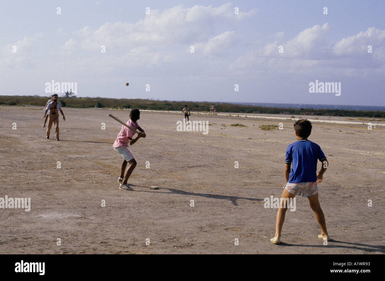 CUBA CHILDREN PLAYING PRATICE GAME ON WASTE GROUND 1993 Stock Photo - Alamy