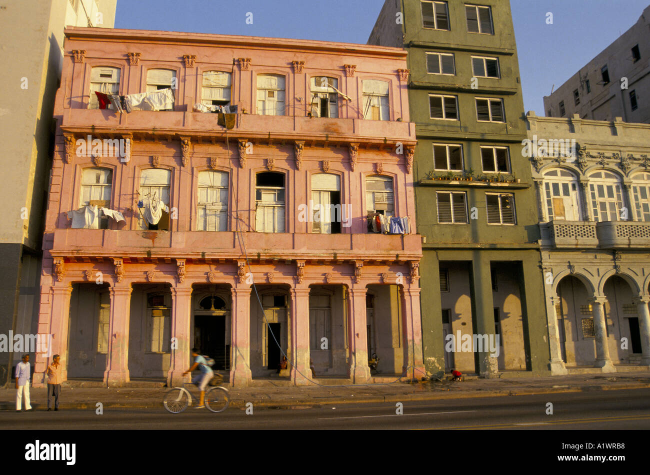 CUBA . CYCLIST PASSING COLONIAL STYLE BUILDINGS PAINTED PINK GREEN 1993 ...