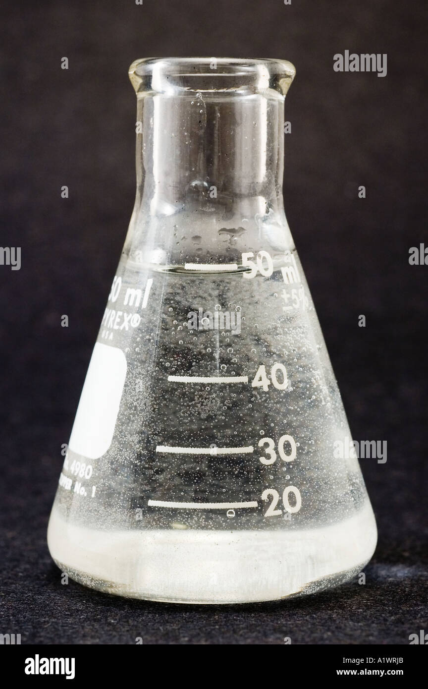 A glass beaker filled with water Stock Photo - Alamy