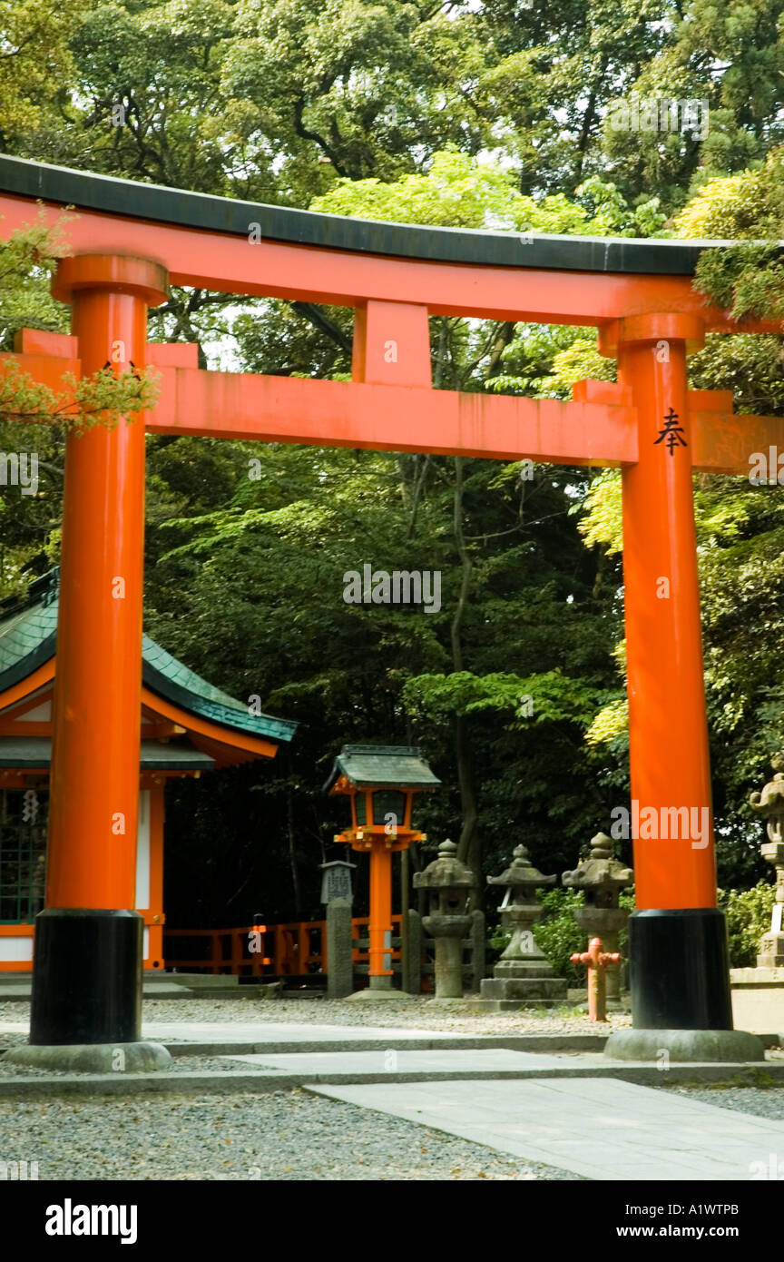 A red torii gate at Fushimi Inari Shrine in Kyoto Japan Stock Photo - Alamy