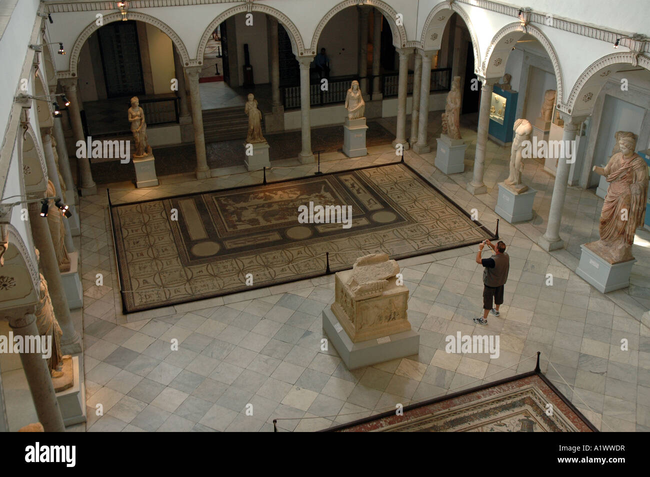 Sculptures from Carthage and mosaic floor in Carthage Room of The Bardo ...