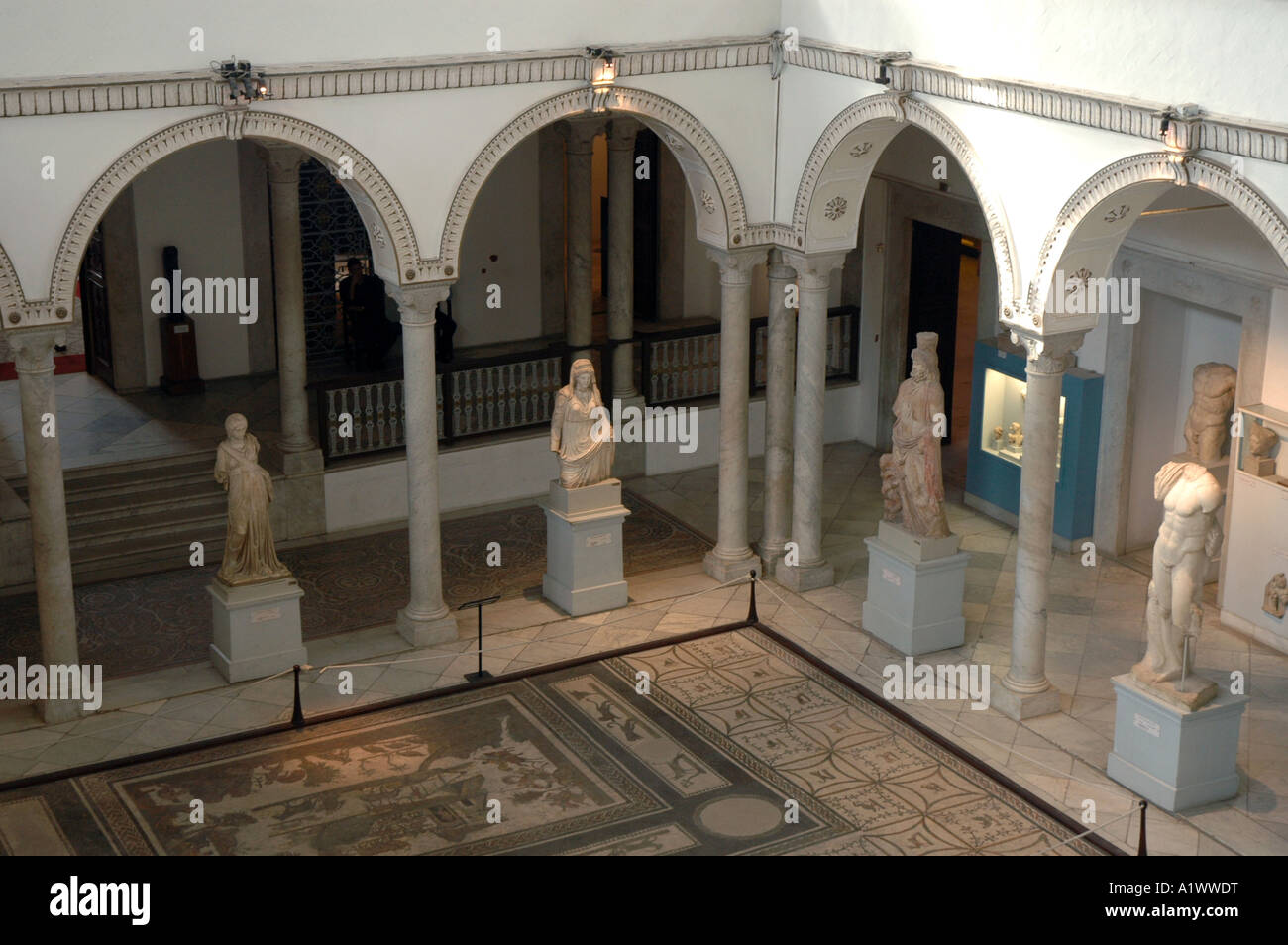 Sculptures from Carthage and mosaic floor in Carthage Room of The Bardo ...