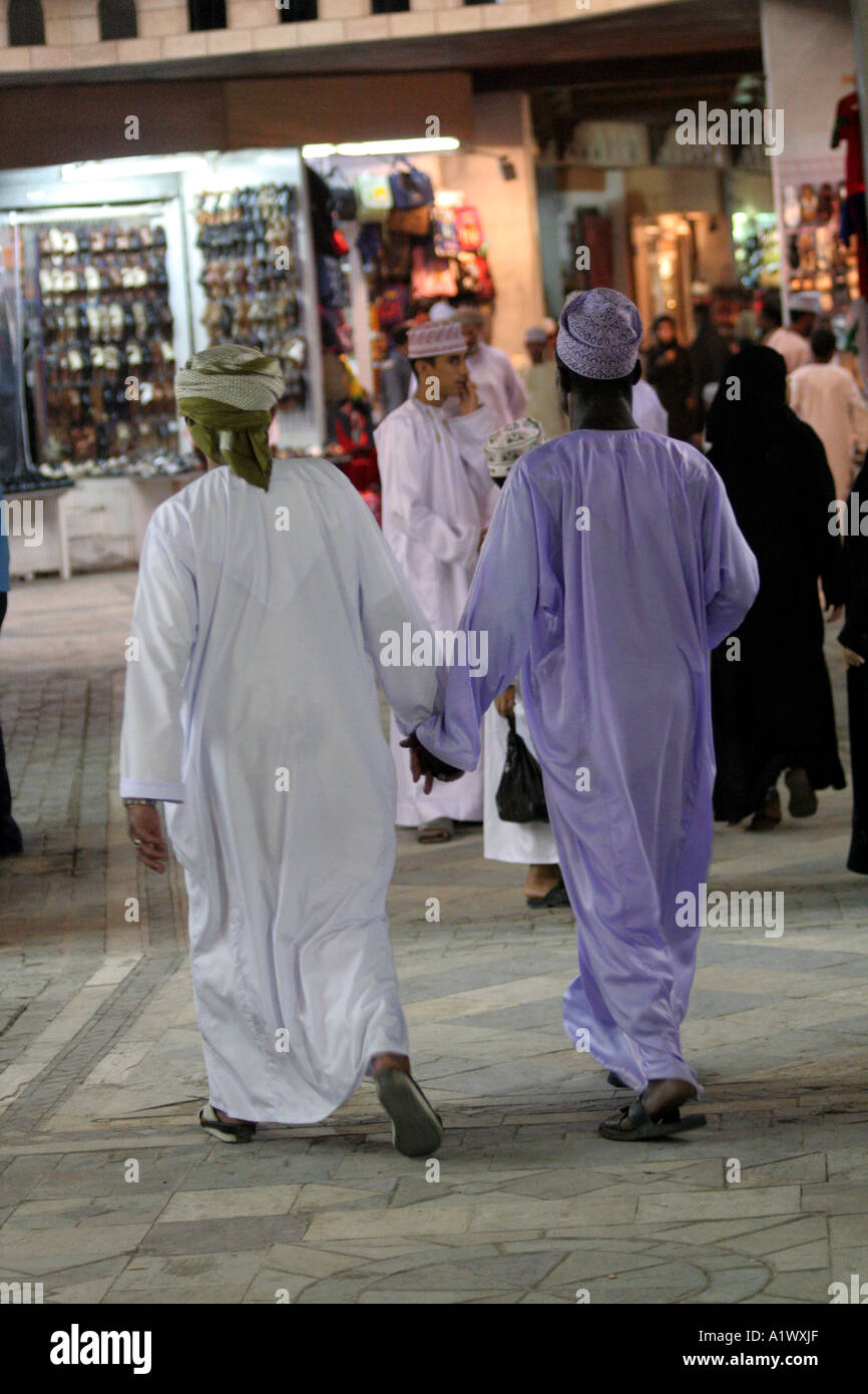 Arab men holding hands hi-res stock photography and images - Alamy