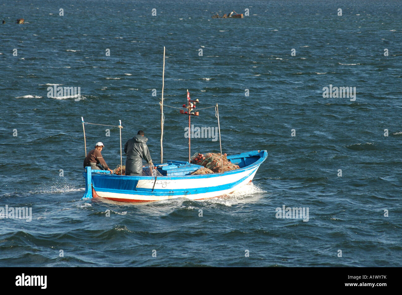 Fishing boat seeing from Ferry crossing from Ajim village on Djerba ...