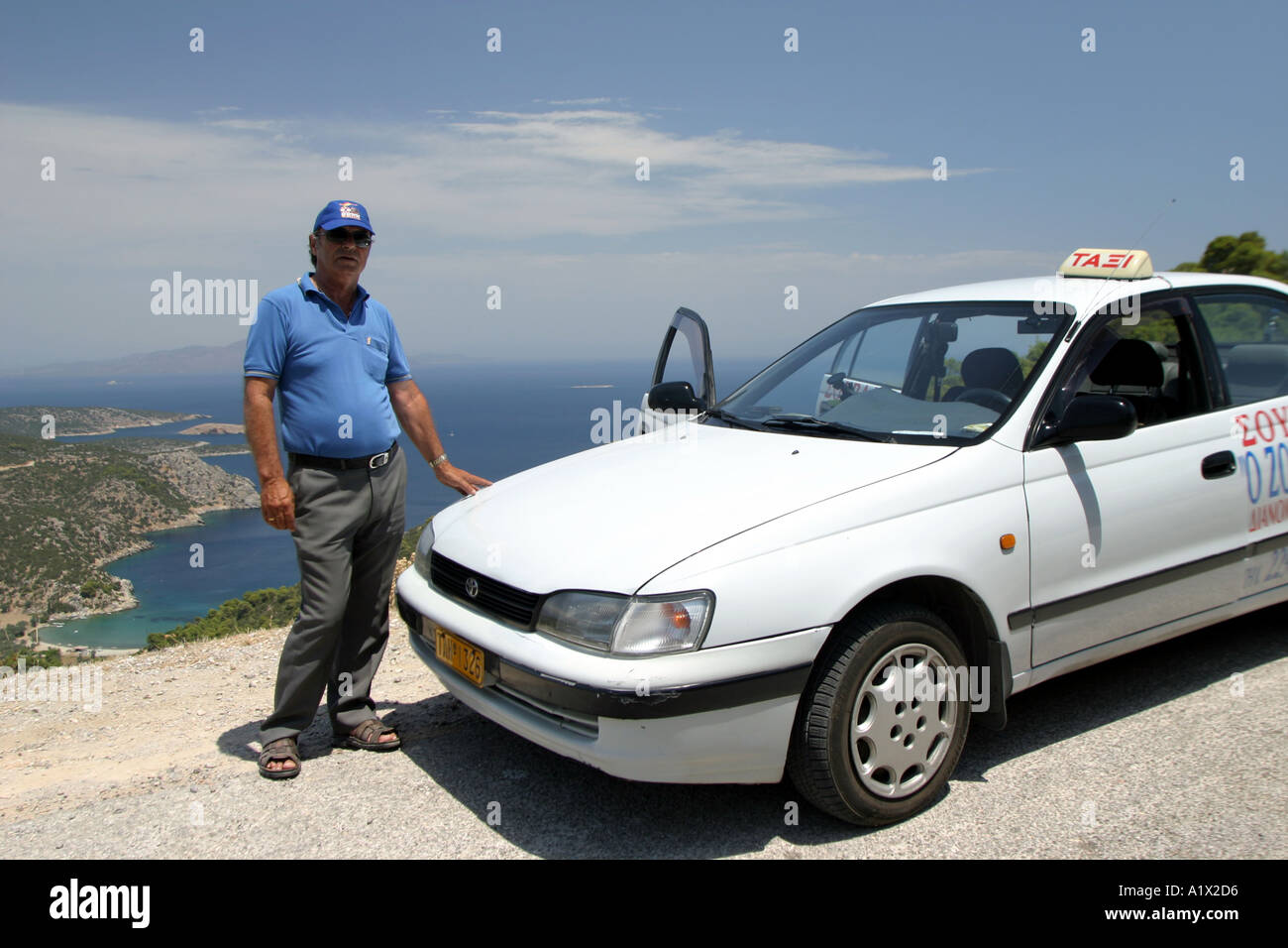 Greek Taxi driver Stock Photo - Alamy